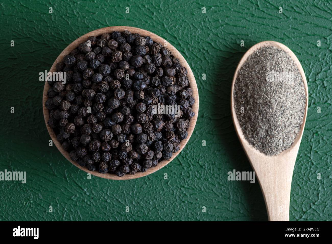 Ground black pepper with grains of black pepper,top view Stock Photo ...