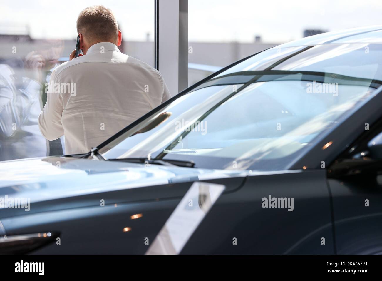 Russia. Moscow. The manager of the car dealership near the Changan car ...