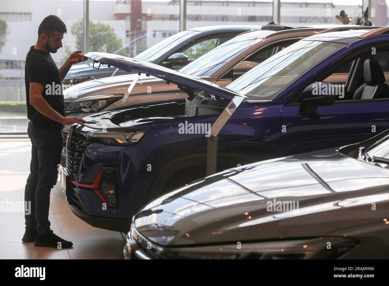 Russia. Moscow. A buyer near the Changan car at the Avilon car ...