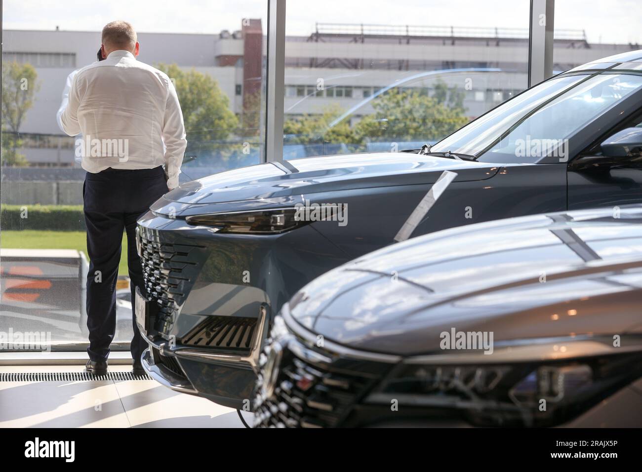 Russia. Moscow. The manager of the car dealership near the Changan car ...