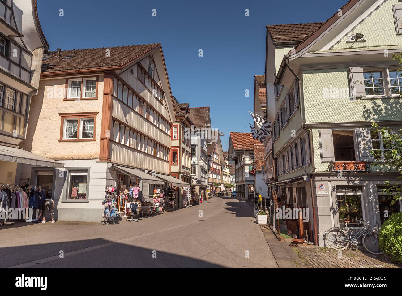 Main street with typical Appenzell houses and small stores in Appenzell ...