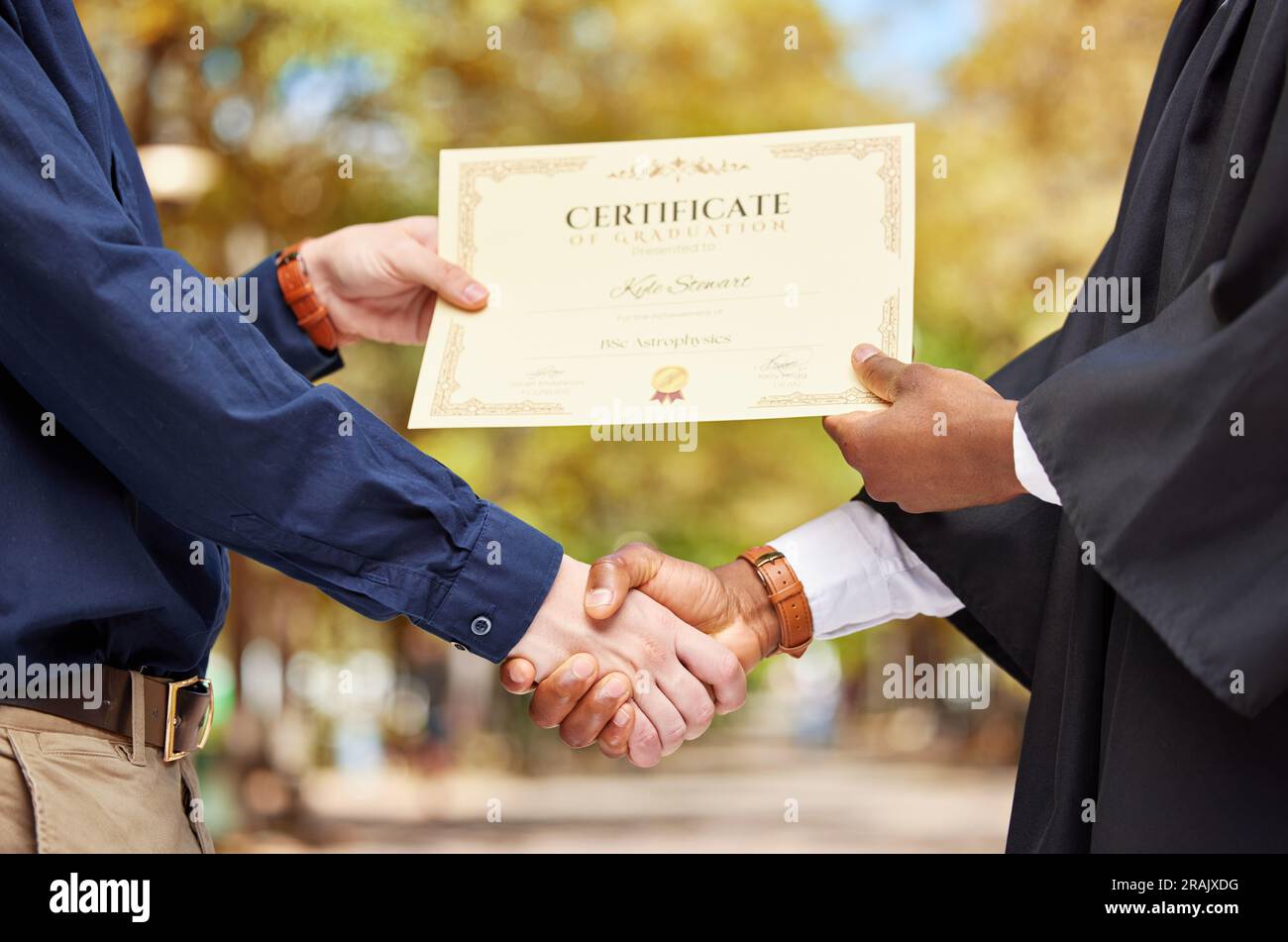 Shaking hands, graduation and certificate for college student with ...