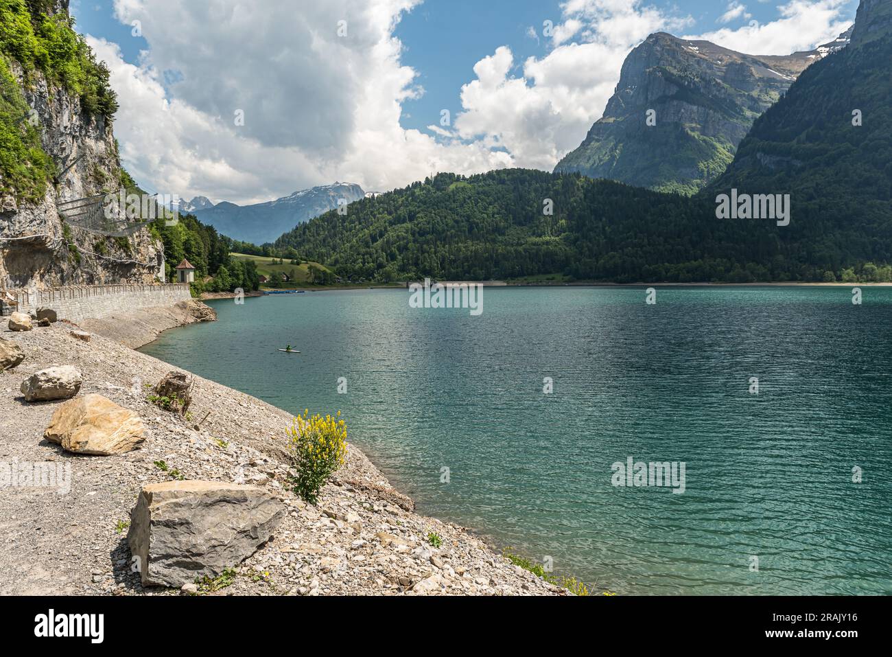 View of Lake Kloentalersee, an idyllic mountain lake in the Glarus Alps ...