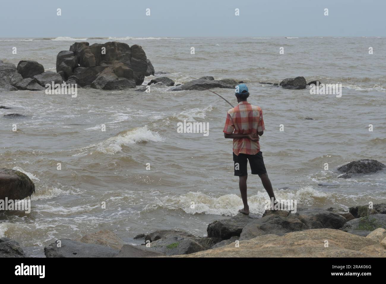 Modara, Colombo, Sri Lanka -August 05th 2022 :A Sri Lankan fisherman ...