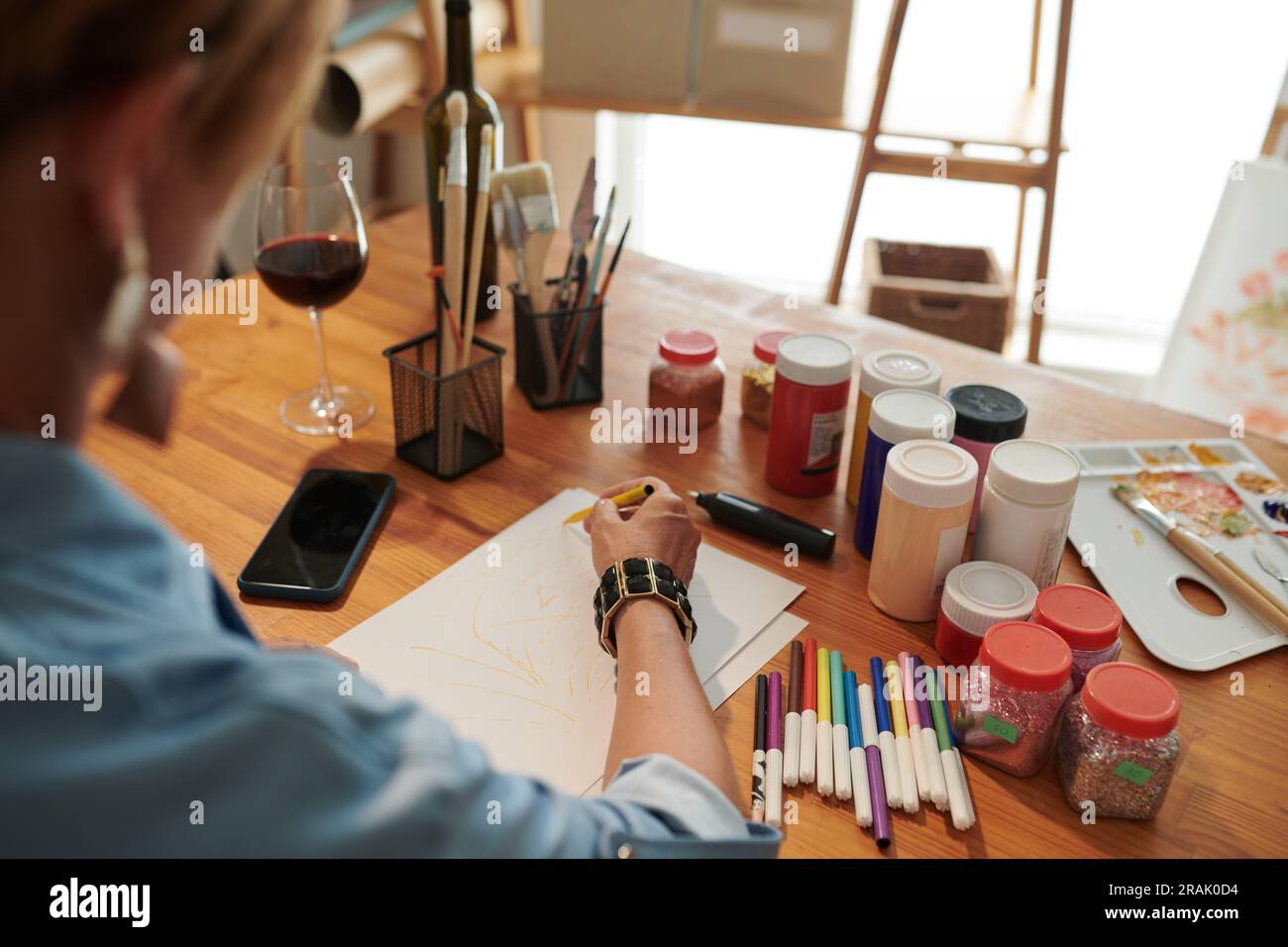 Creative woman drawing picture with felt tip pens Stock Photo - Alamy