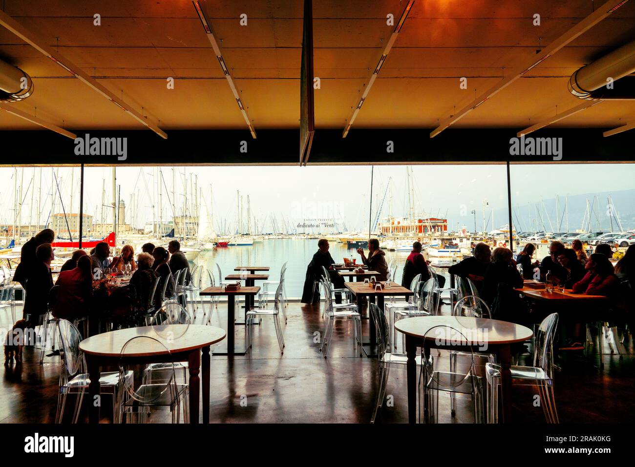 Interior of the restaurant in "Eataly" with view of the Marina di San ...
