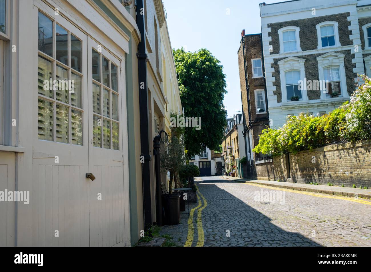 Kensington, London- back street cobble stoned street off Kensington ...