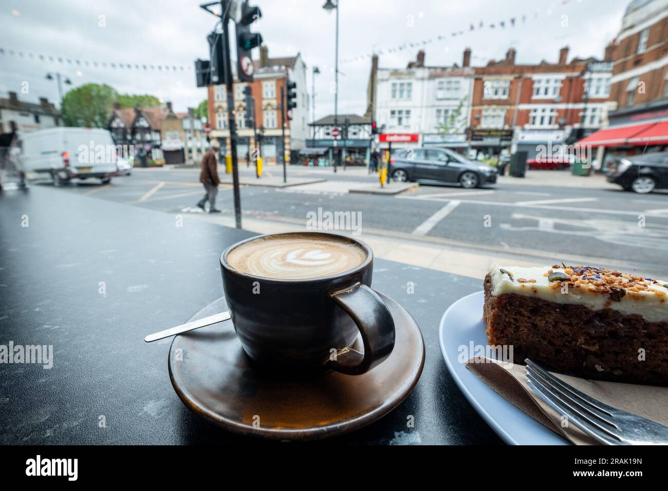 London- June 2023: View from a coffee shop of Hanwell high street in ...