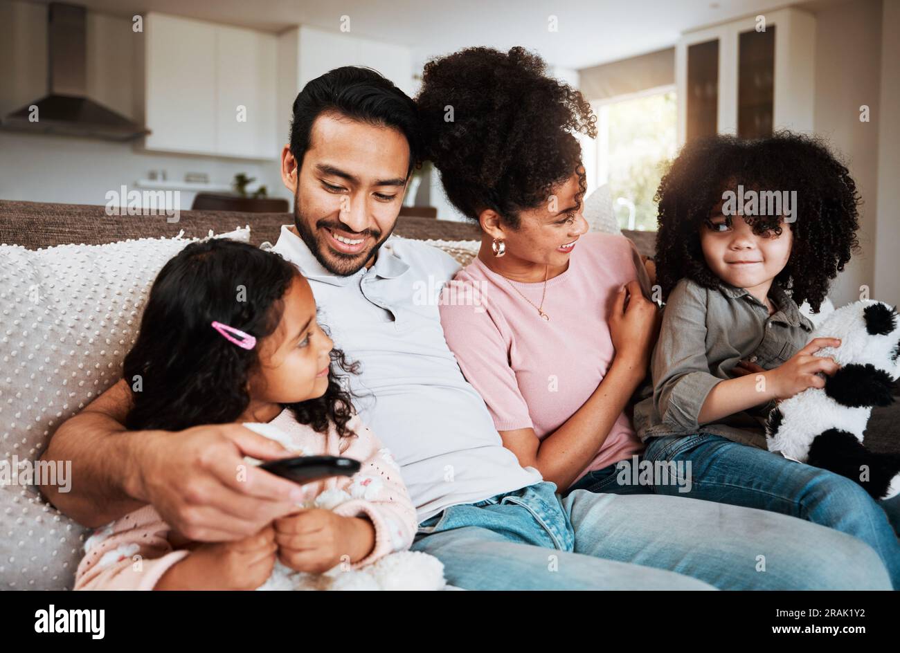 Happy family, parents and kids watching tv in home of movies, film ...