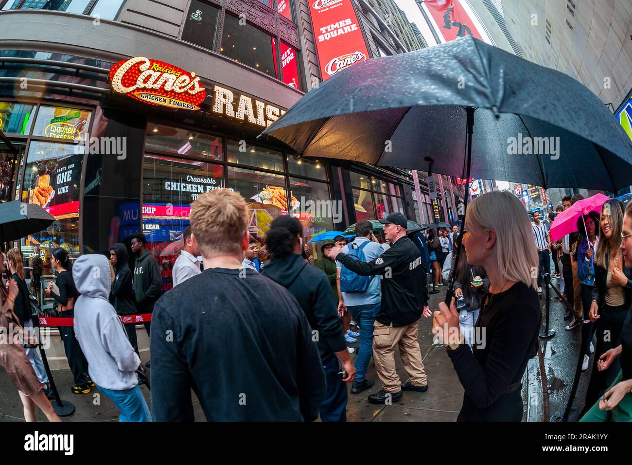 Hordes of chicken finger lovers flock to the grand opening of Raising ...