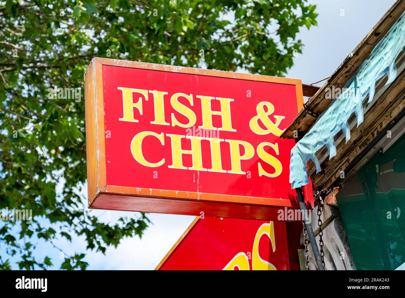 London- June 2023: Fish and Chips sign on shop on Ealing, West London Stock Photo - Alamy