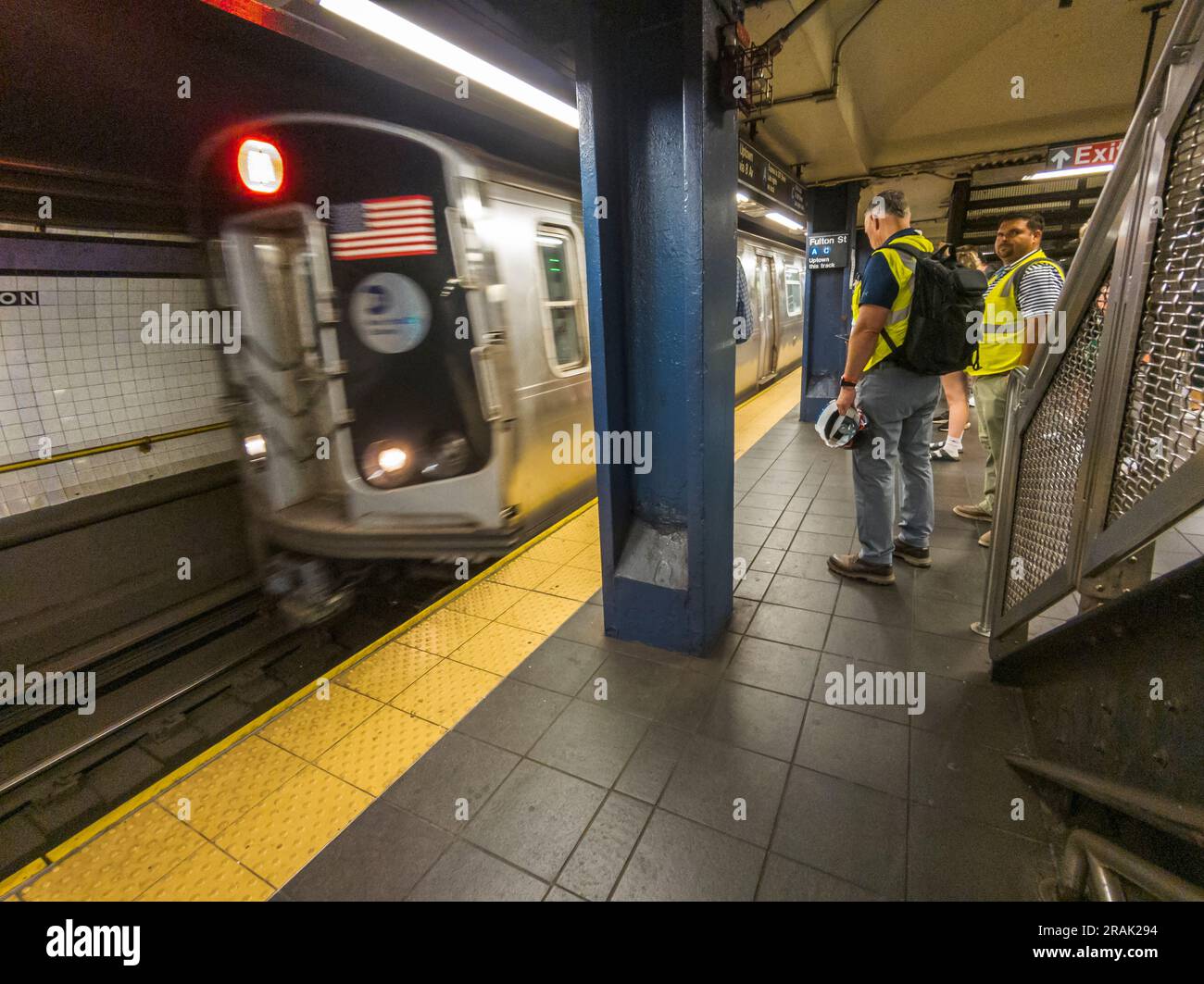 Subway train arrives fulton street hi-res stock photography and images ...