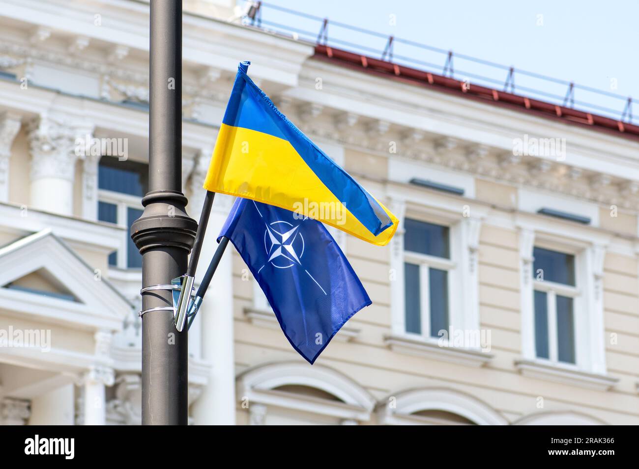 Flags of NATO and of Ukraine during Nato summit 2023 in the centre of ...