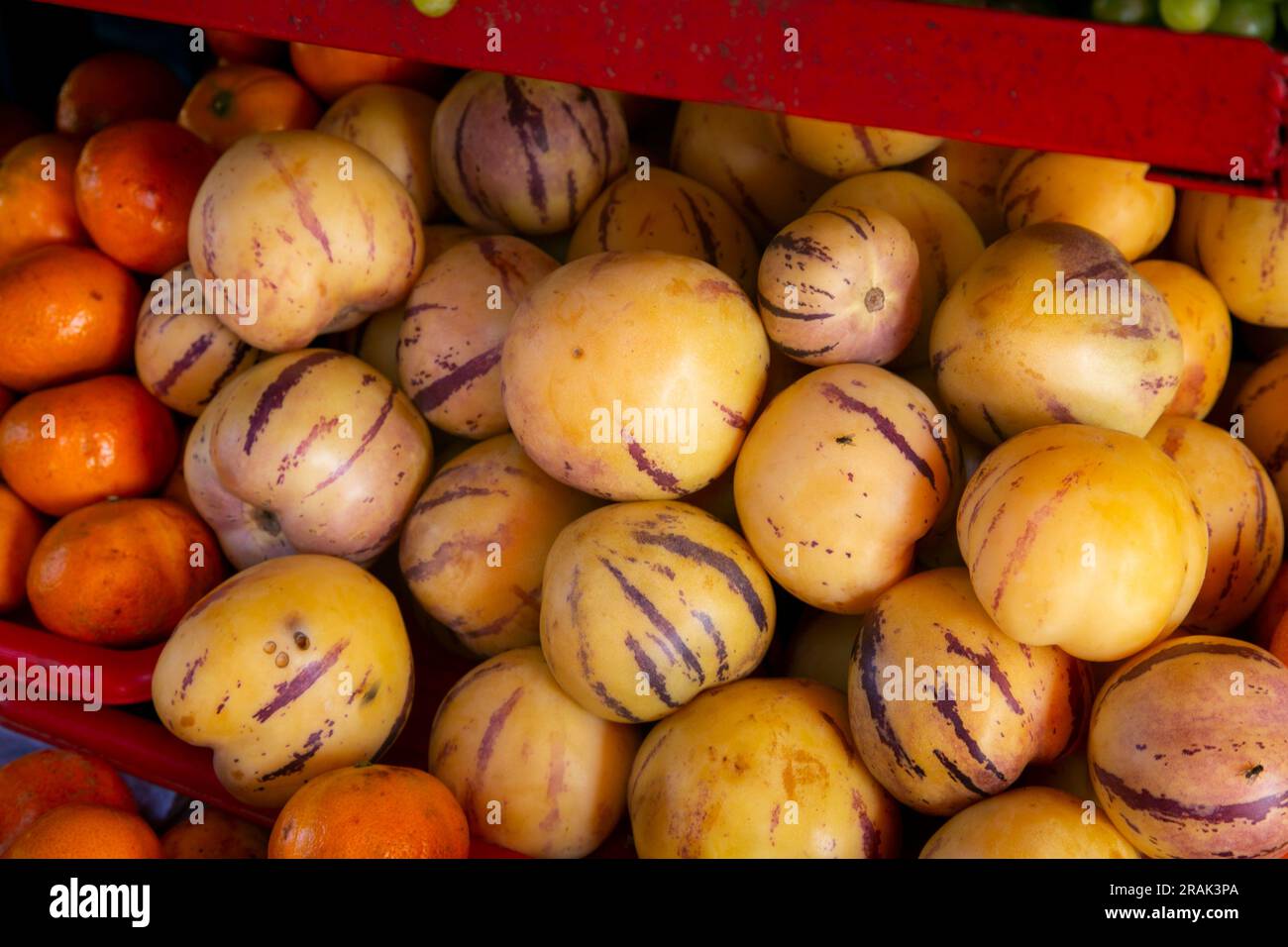 Variety of Peruvian mango from the Peruvian jungle area in a market in ...