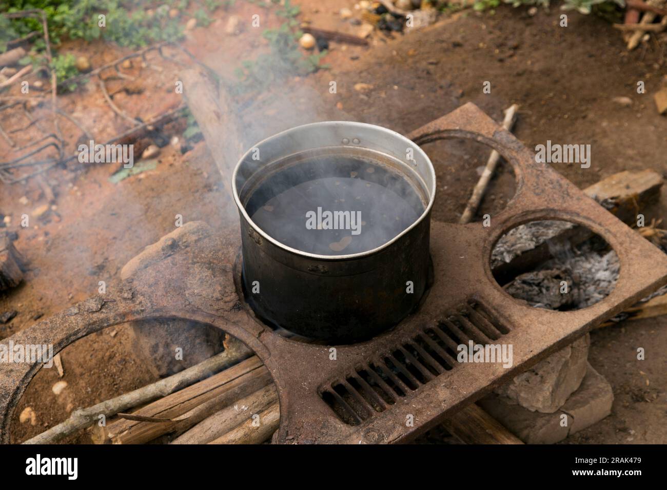 Cooking organic black barley soda in the Peruvian jungle Stock Photo ...