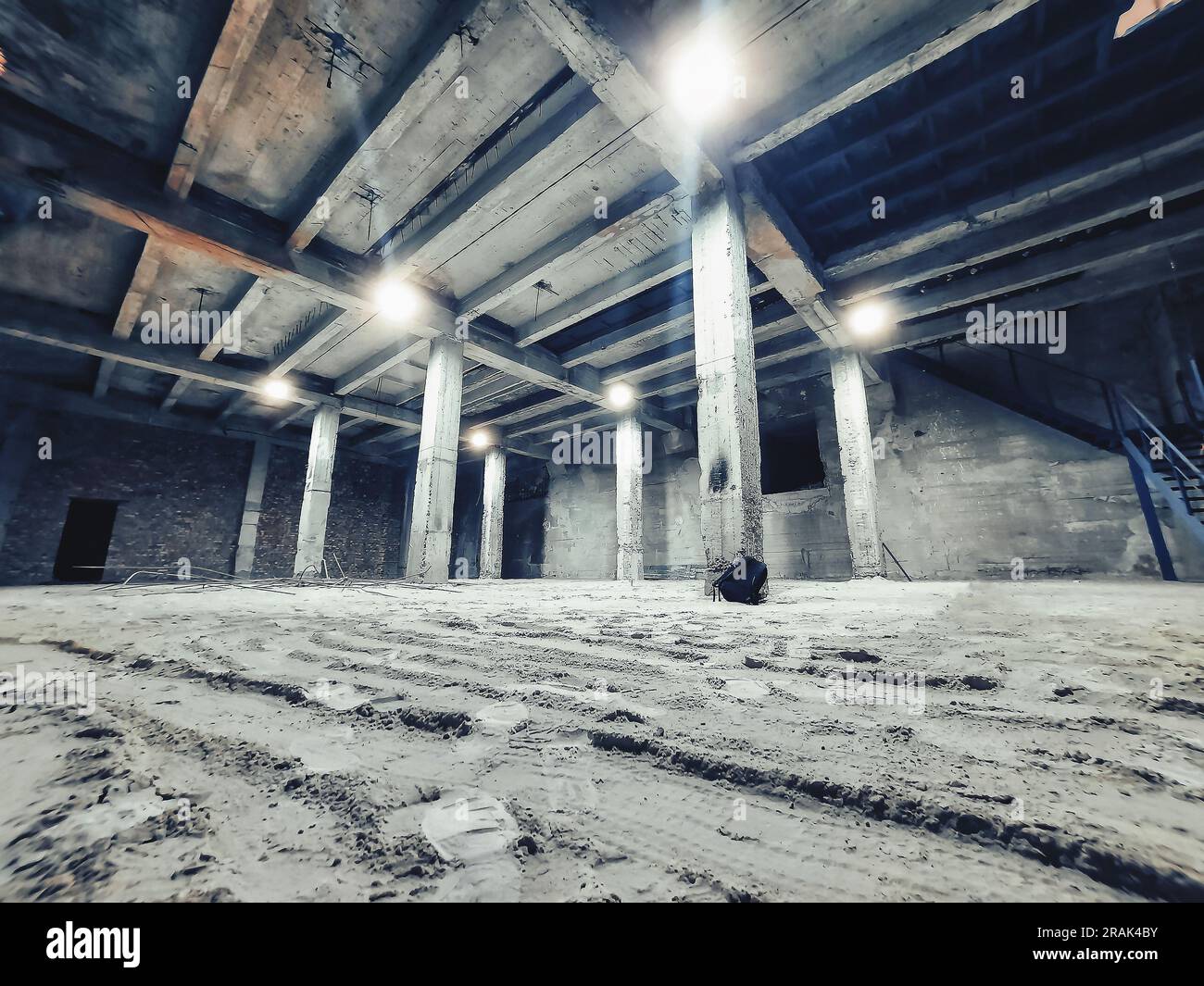 Concrete basement with pillars, lanterns Stock Photo - Alamy