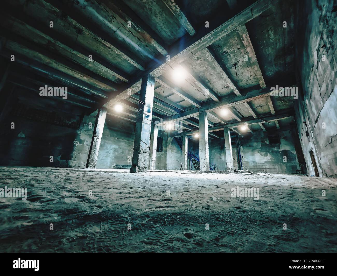 Concrete basement with pillars, lanterns Stock Photo - Alamy