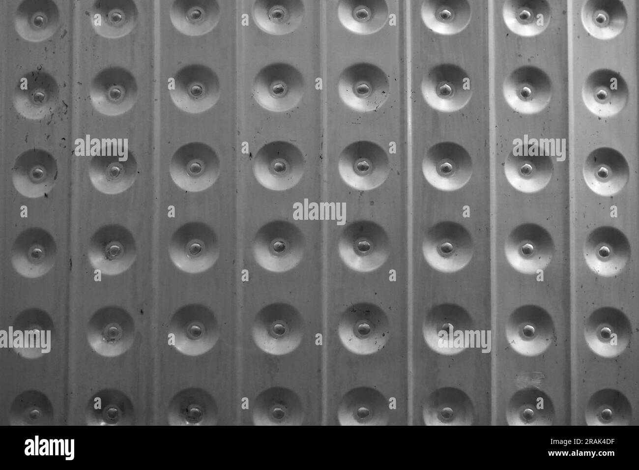 Studded plate Black and White Stock Photos & Images - Alamy