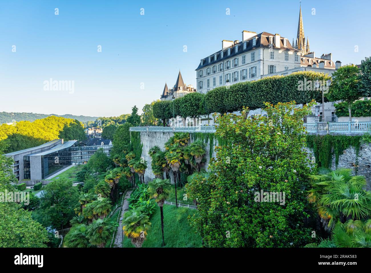 Ancient historic buildings on a hill by the river in the city of Pau ...