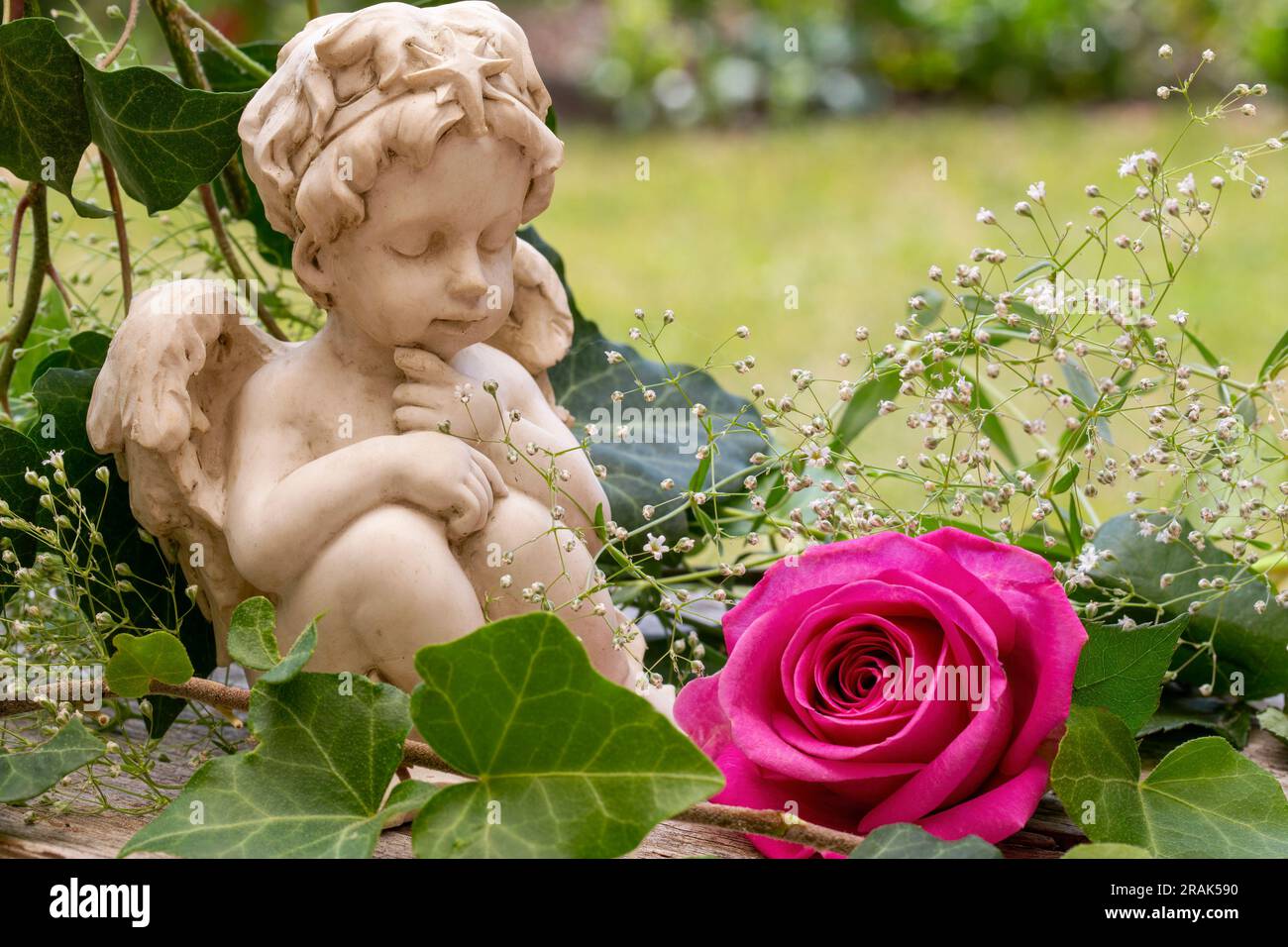 Beautiful angel statue floral hi-res stock photography and images - Alamy
