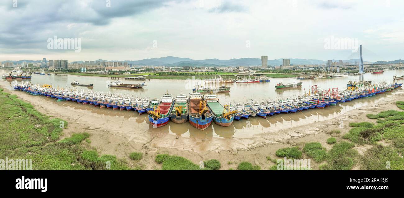 ZHOUSHAN, CHINA - JULY 4, 2023 - Fishing boats are docked at Shenjiamen ...