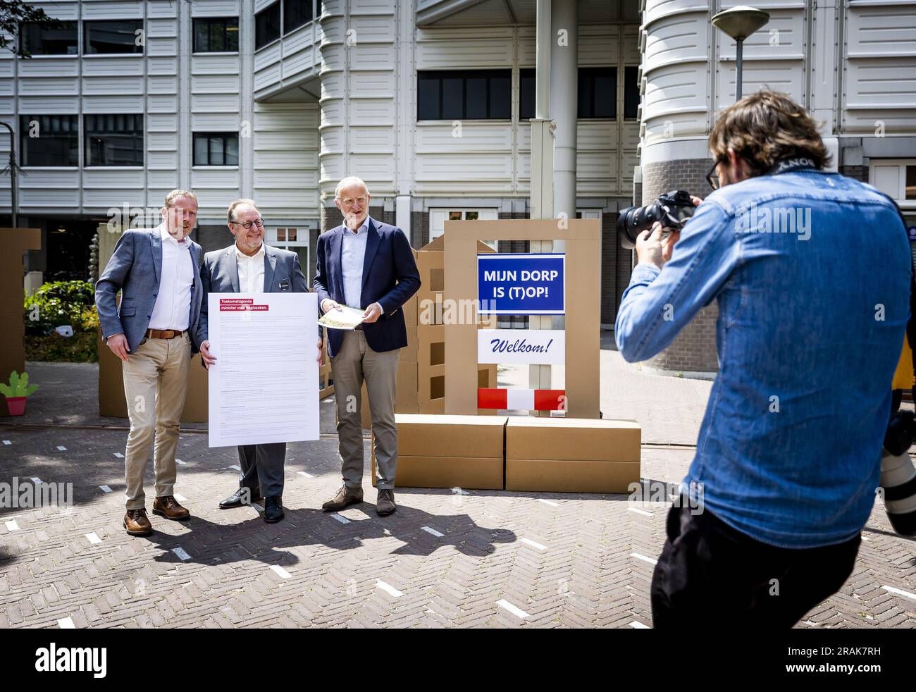 THE HAGUE - Netherlands, 04/07/2023, THE HAGUE - With a cardboard ...