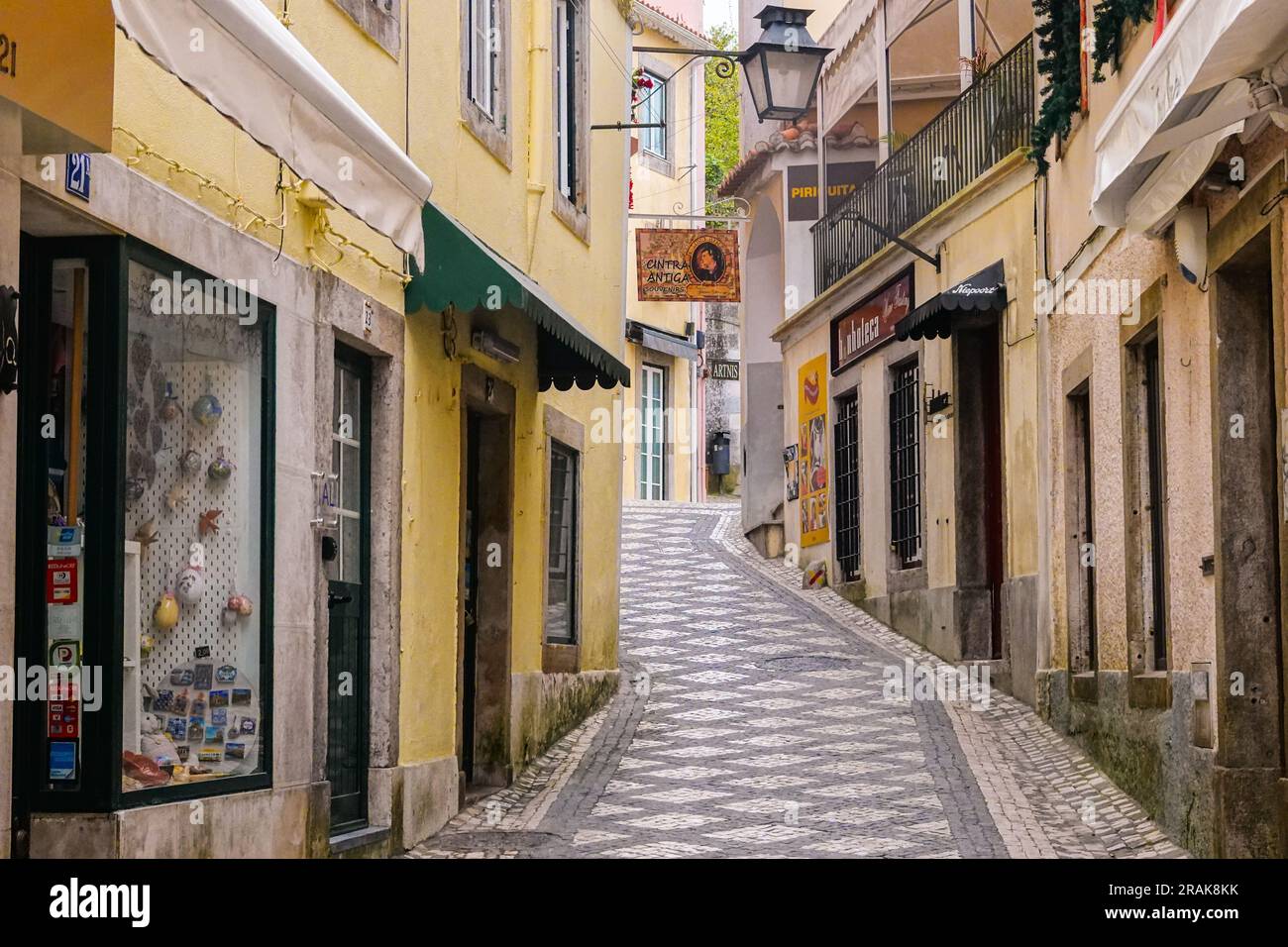 The pastel colored buildings and cobble pedestrian walkways of the ...