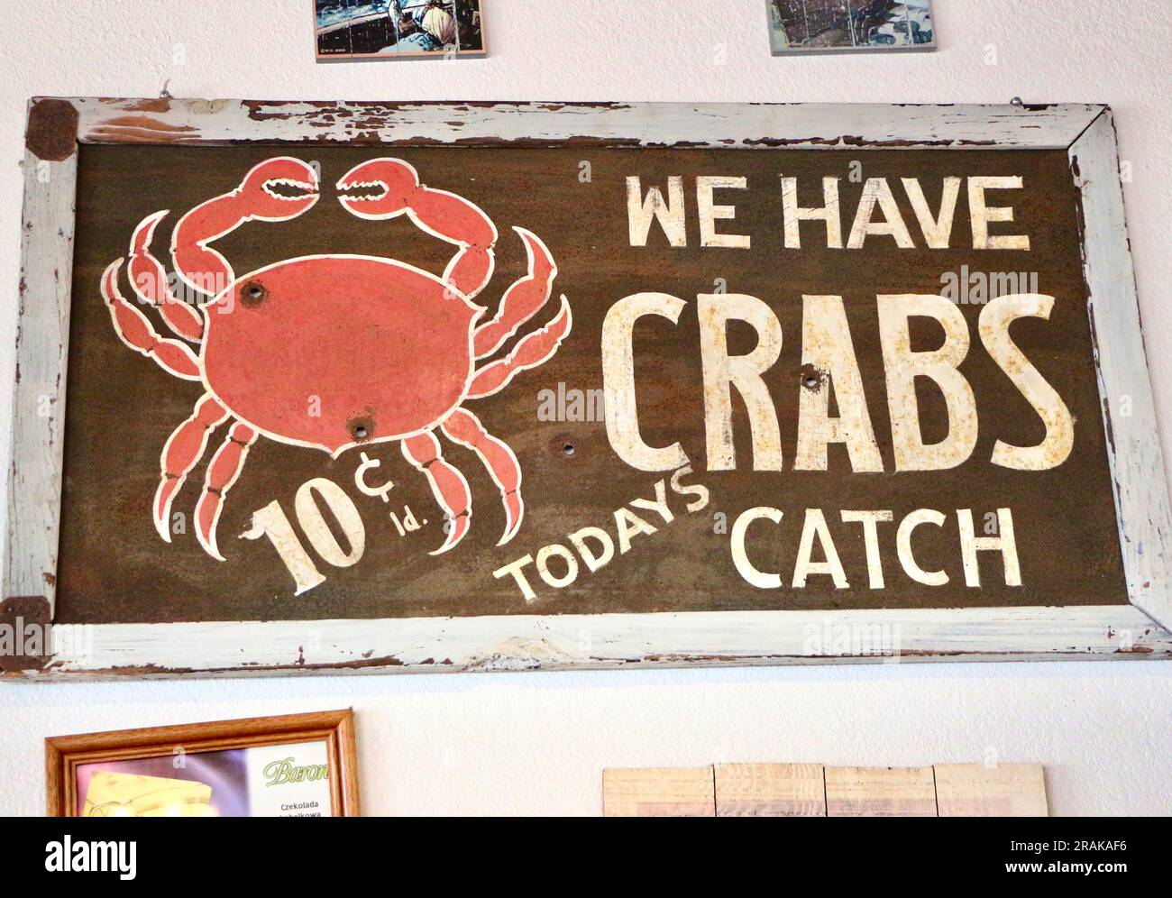 Wall sign We Have Crabs Today's Catch 10 cents with bullet holes Pier ...
