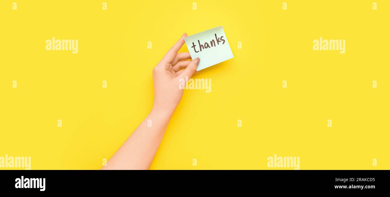 Hand holding sticky note written note hi-res stock photography and ...