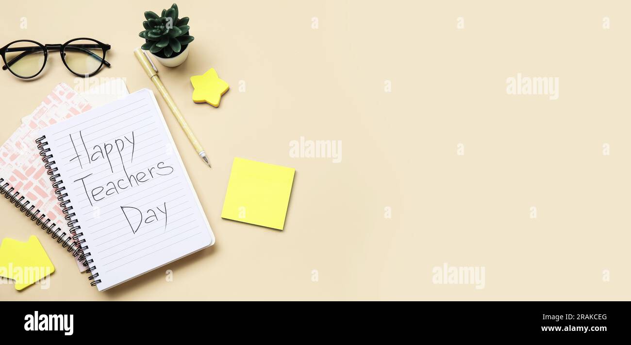 Notebooks with text HAPPY TEACHERS DAY, eyeglasses and stationery on ...