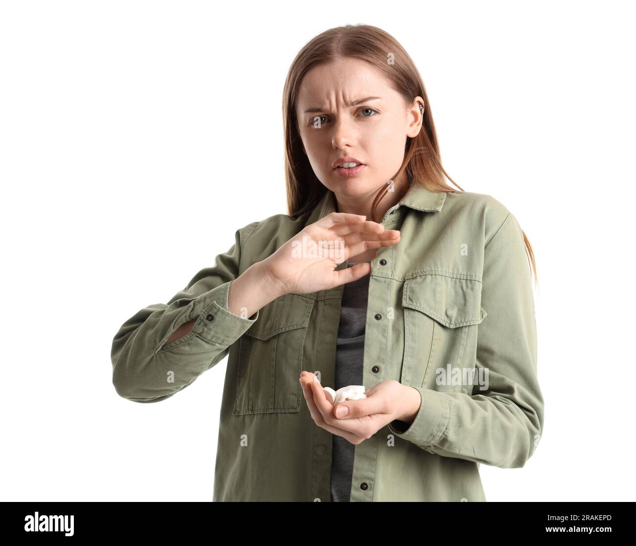 Young female junkie rejecting drugs on white background Stock Photo - Alamy