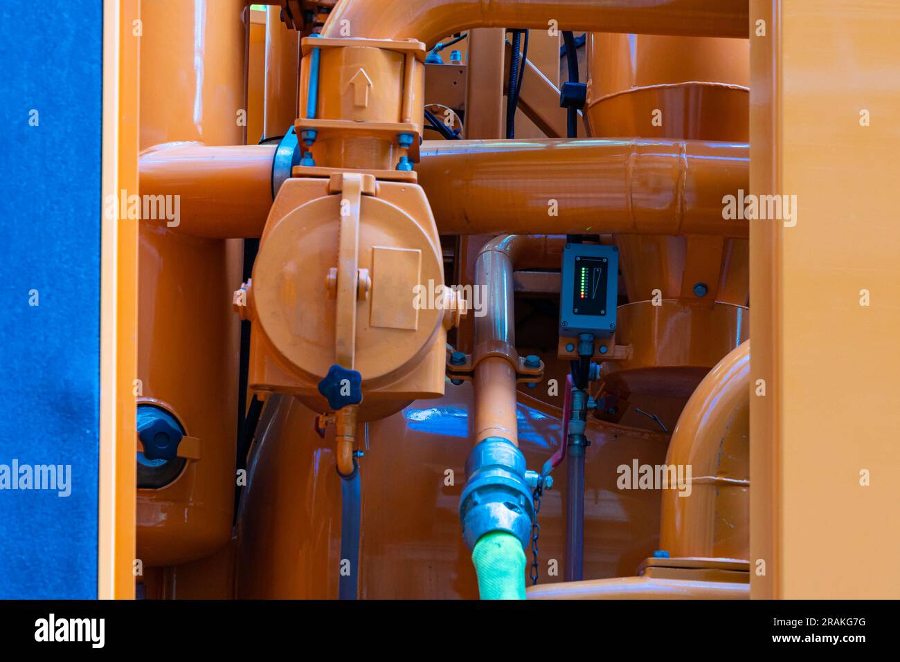 A fragment of the inside of a fire engine with various pipes for water ...