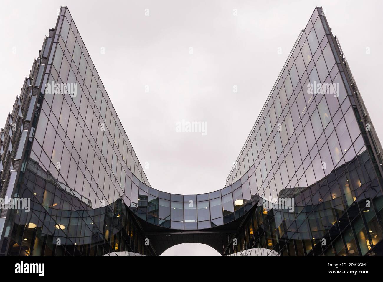 a curved building near The Shard Stock Photo - Alamy