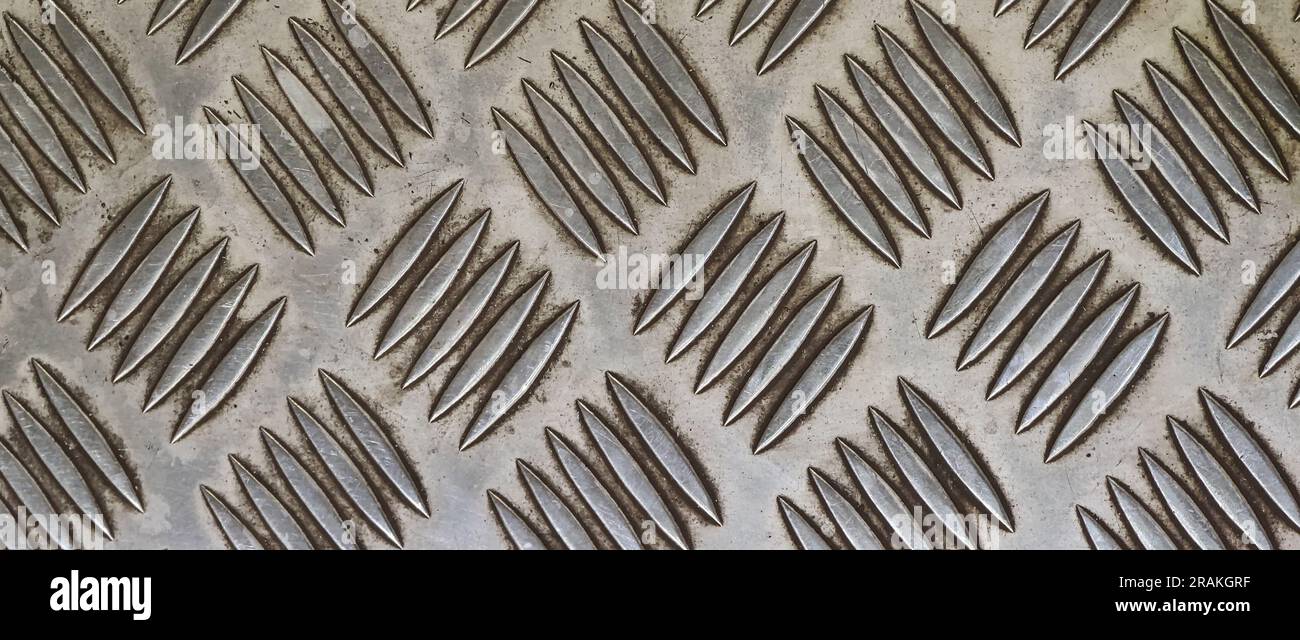Dirty old diamond plate with dust and stain industrial checker tread ...
