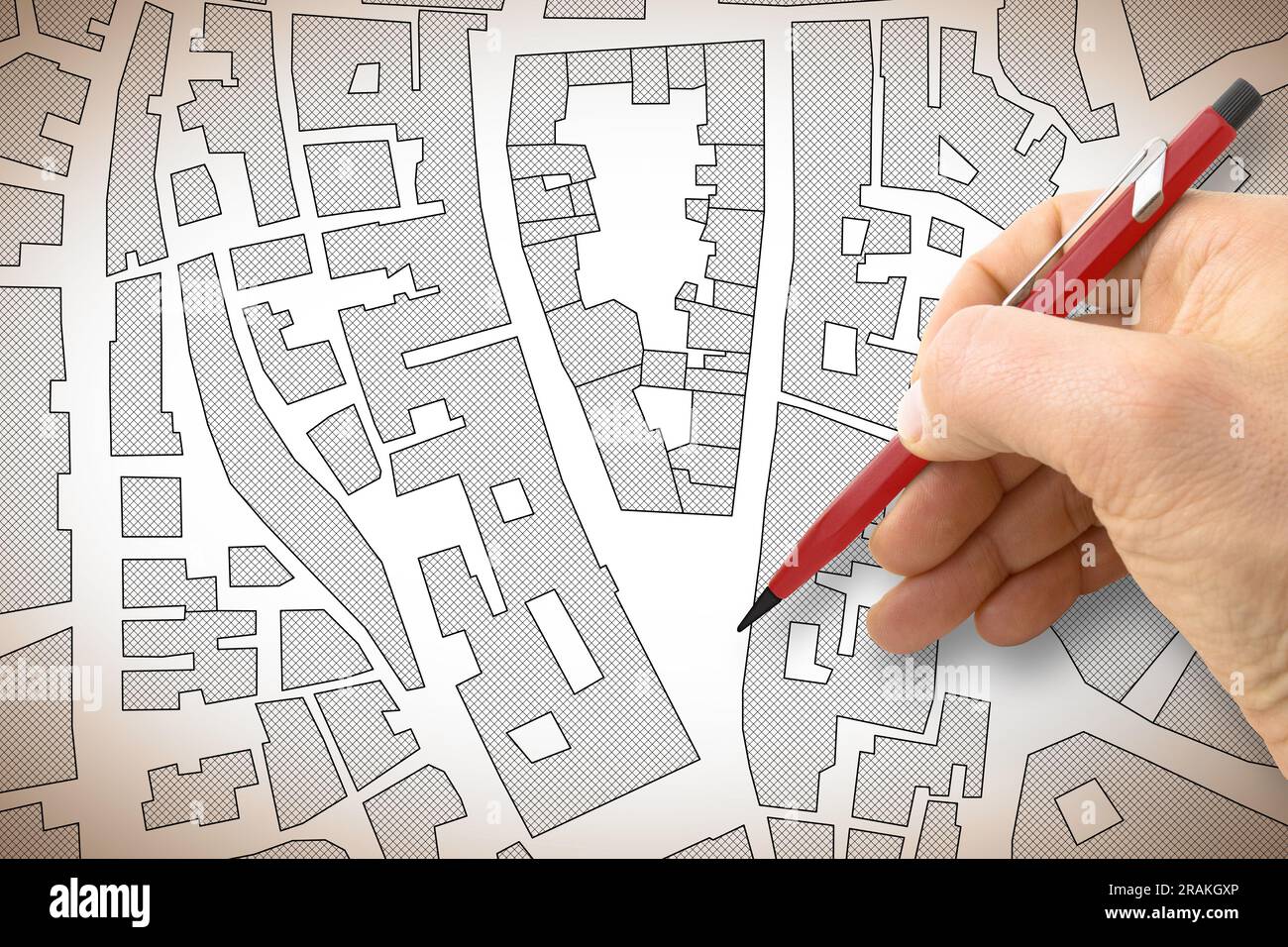 Engineer drawing an imaginary map of an historical center of an old ...