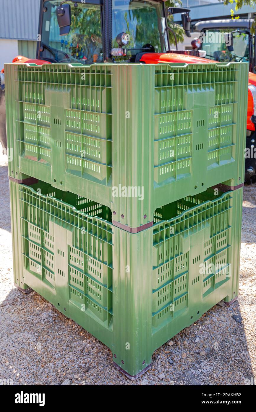 Stacked Green Plastic Pallet Boxes for Fruits and Vegetables Farm ...