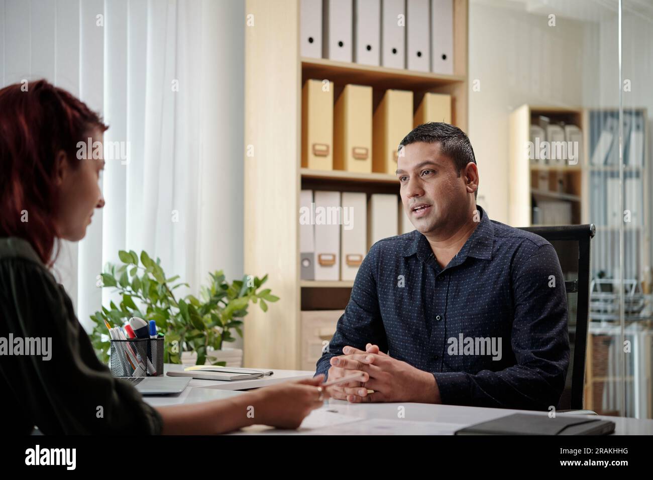 Businessman conducting job interview hi-res stock photography and images - Alamy