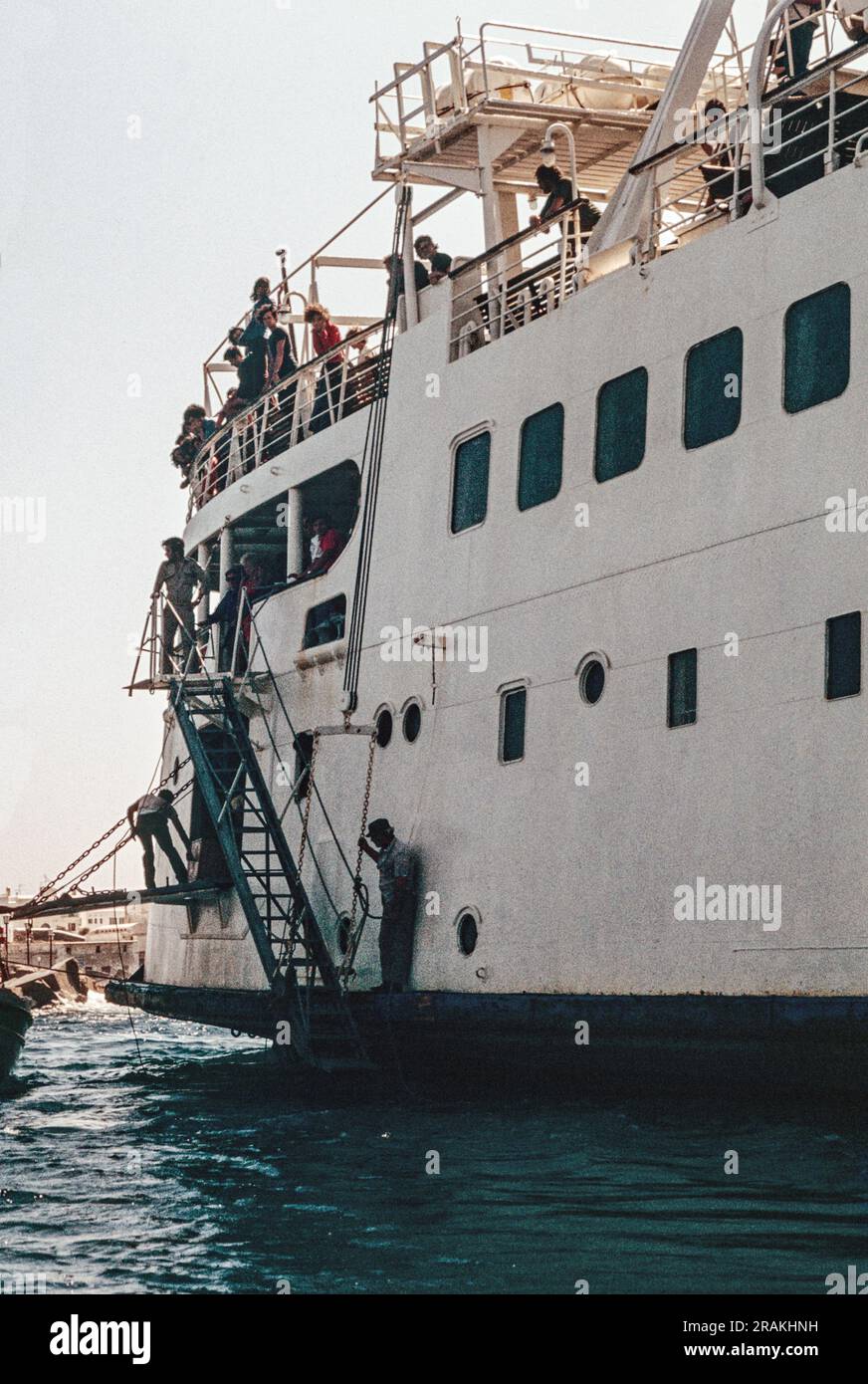 Upright image; portrait format; unloading trunk; Scanned image In the ...