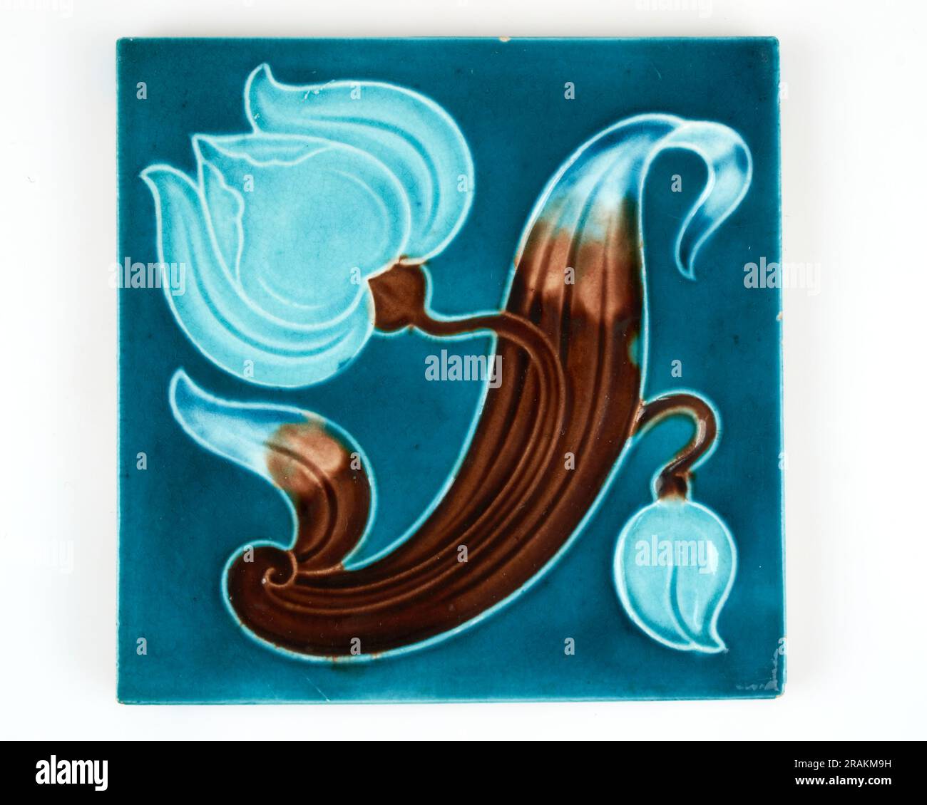 Antique 1900s English Art Nouveau blue tulip pottery tile Stock Photo ...
