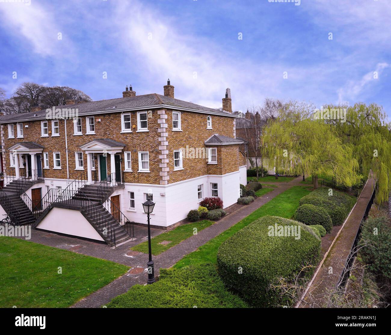 Three story brick semi-detached houses with willow trees Stock Photo ... Three story brick semi-detached houses with willow trees Stock Photo ...