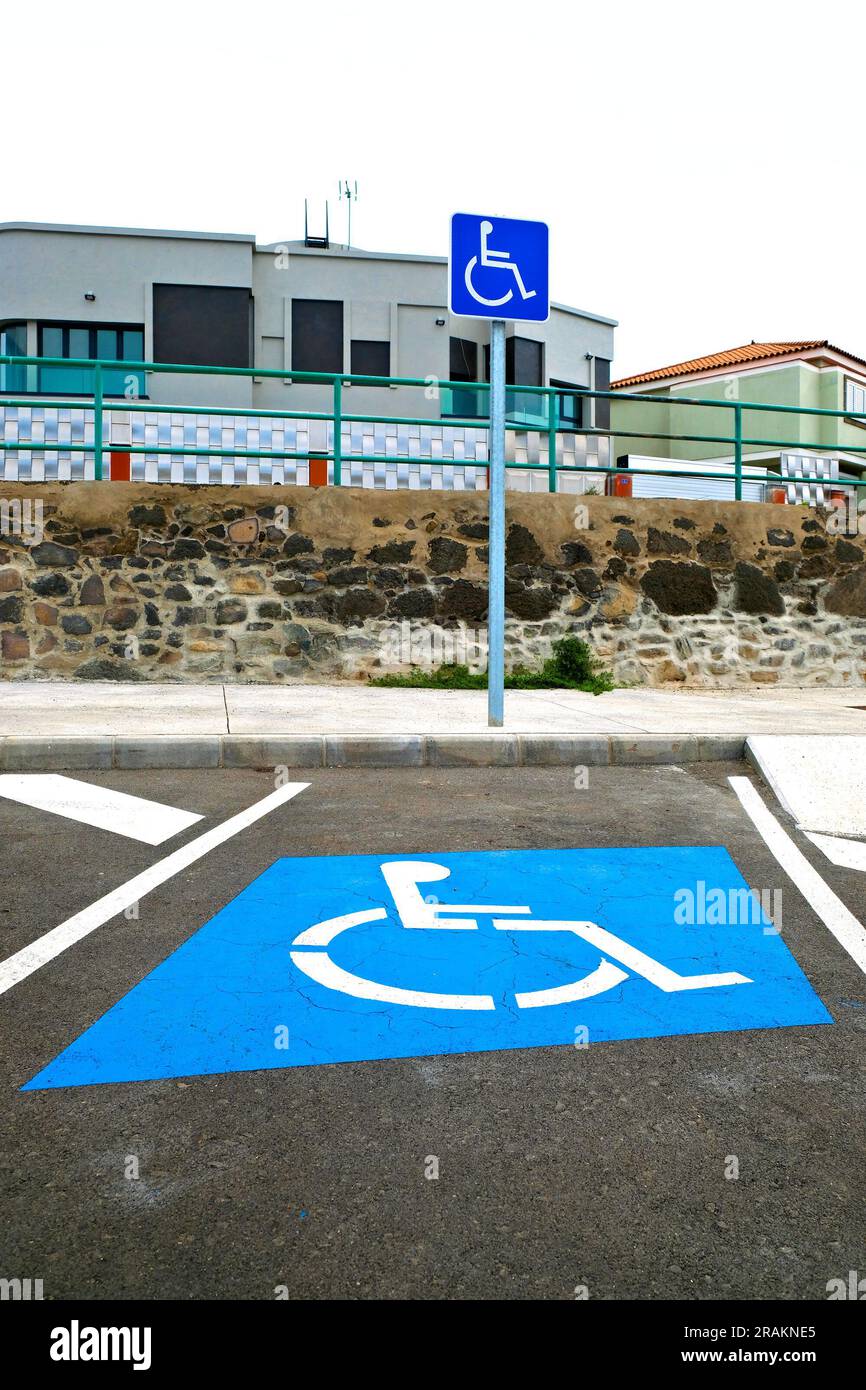 International Symbol of Access (ISA) on a parking lot for handicapped ...