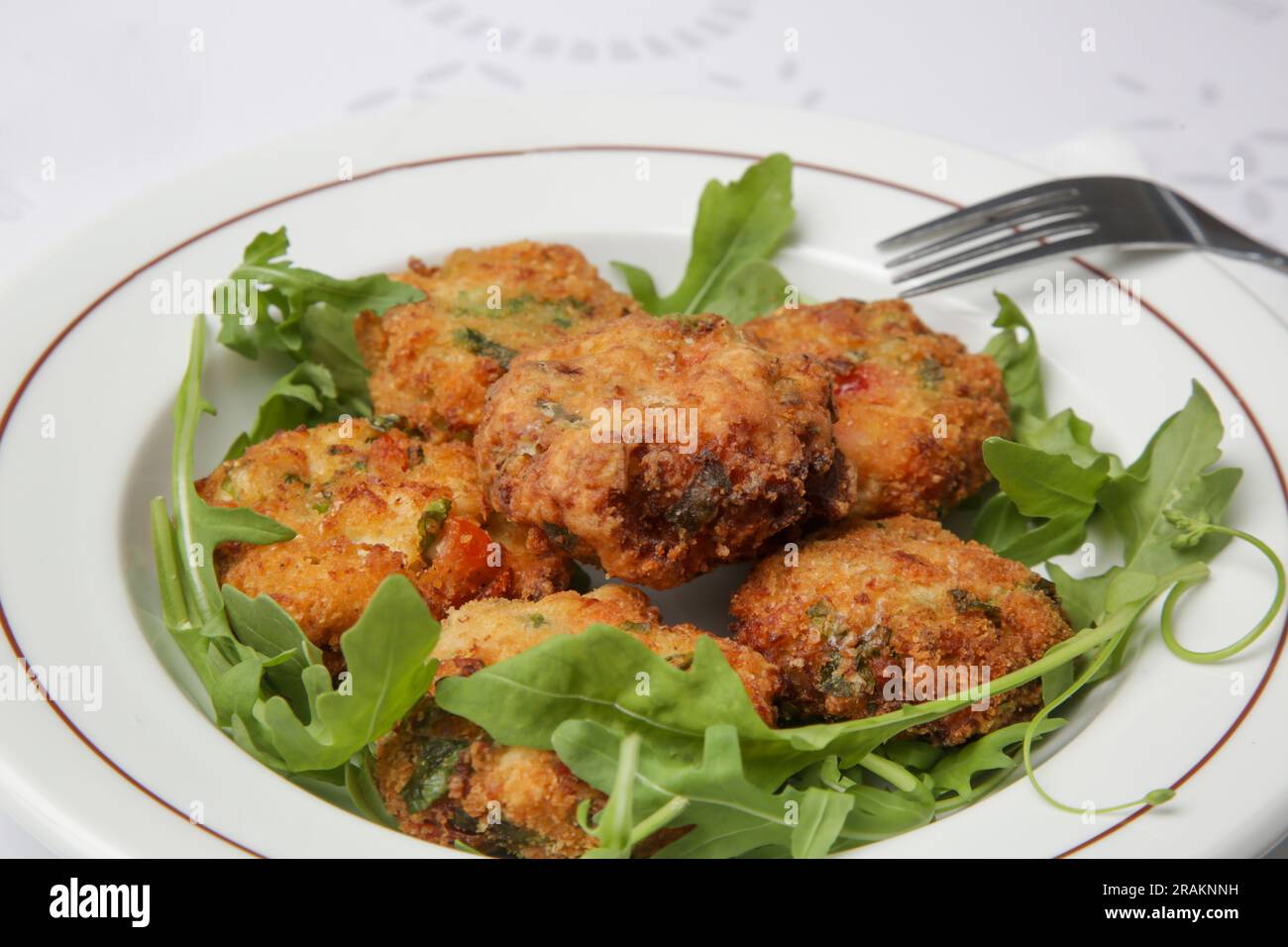 Traditional fish cakes served in the restaurant Stock Photo - Alamy
