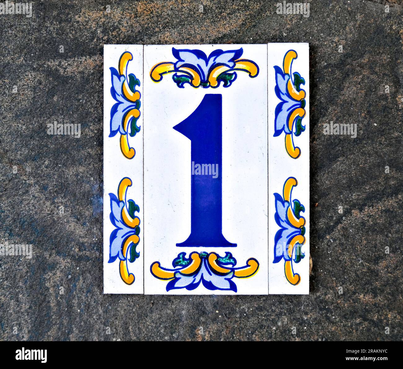1, number one, decorative tile on a stone surface Stock Photo - Alamy