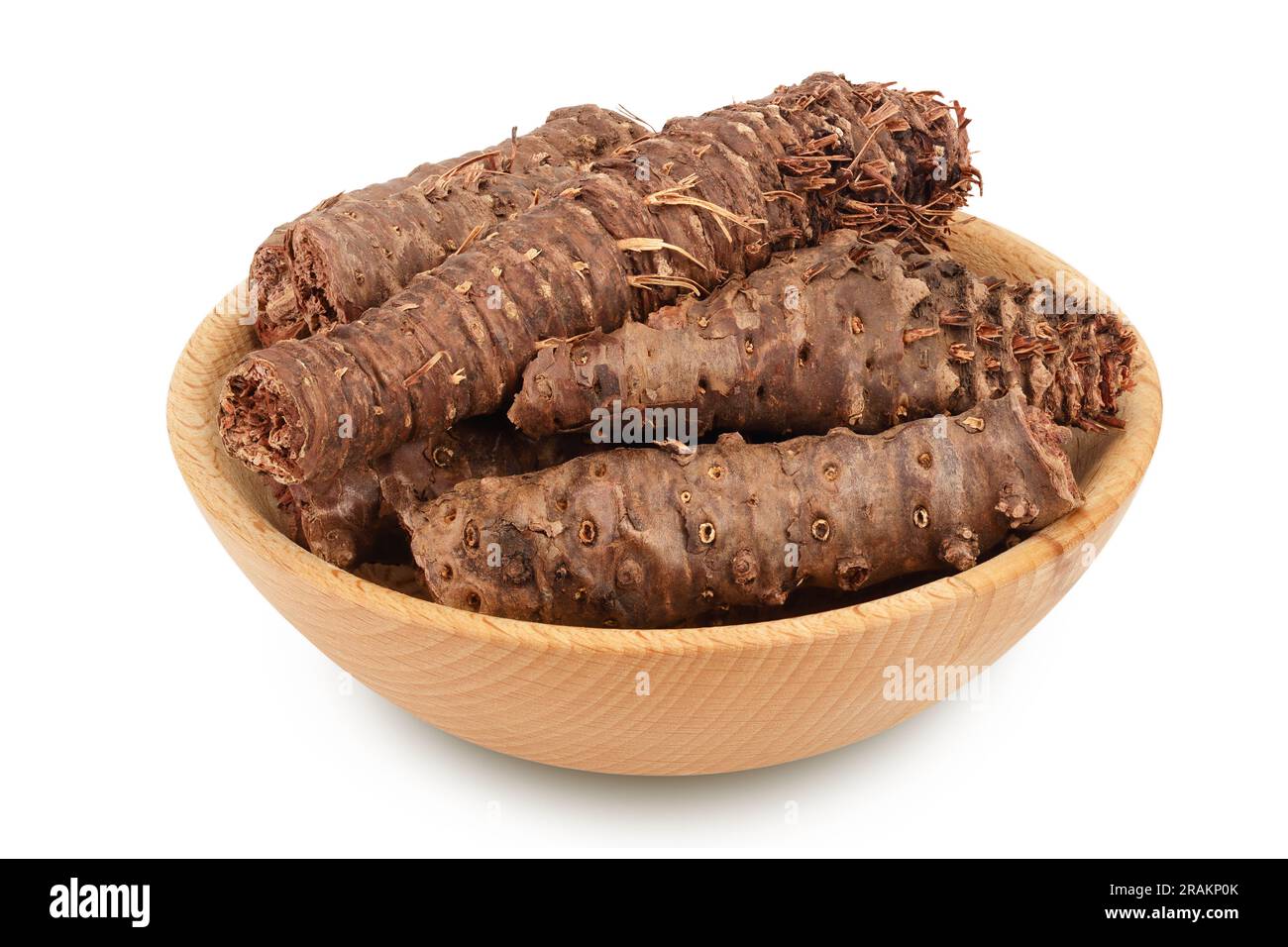 Rhodiola rosea root in wooden bowl isolated on white background with ...