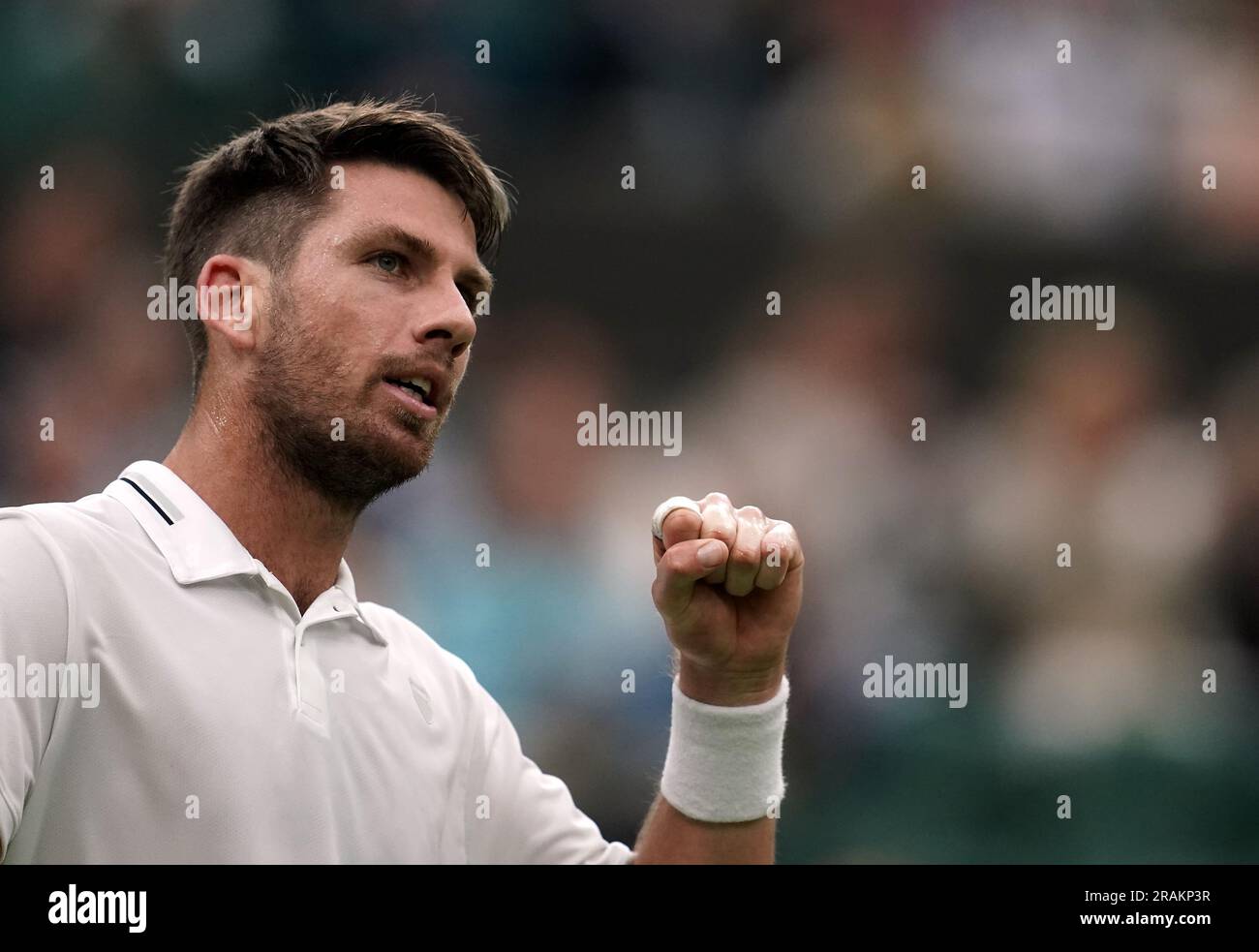 Cameron Norrie celebrates winning the first set against Tomas Machac ...