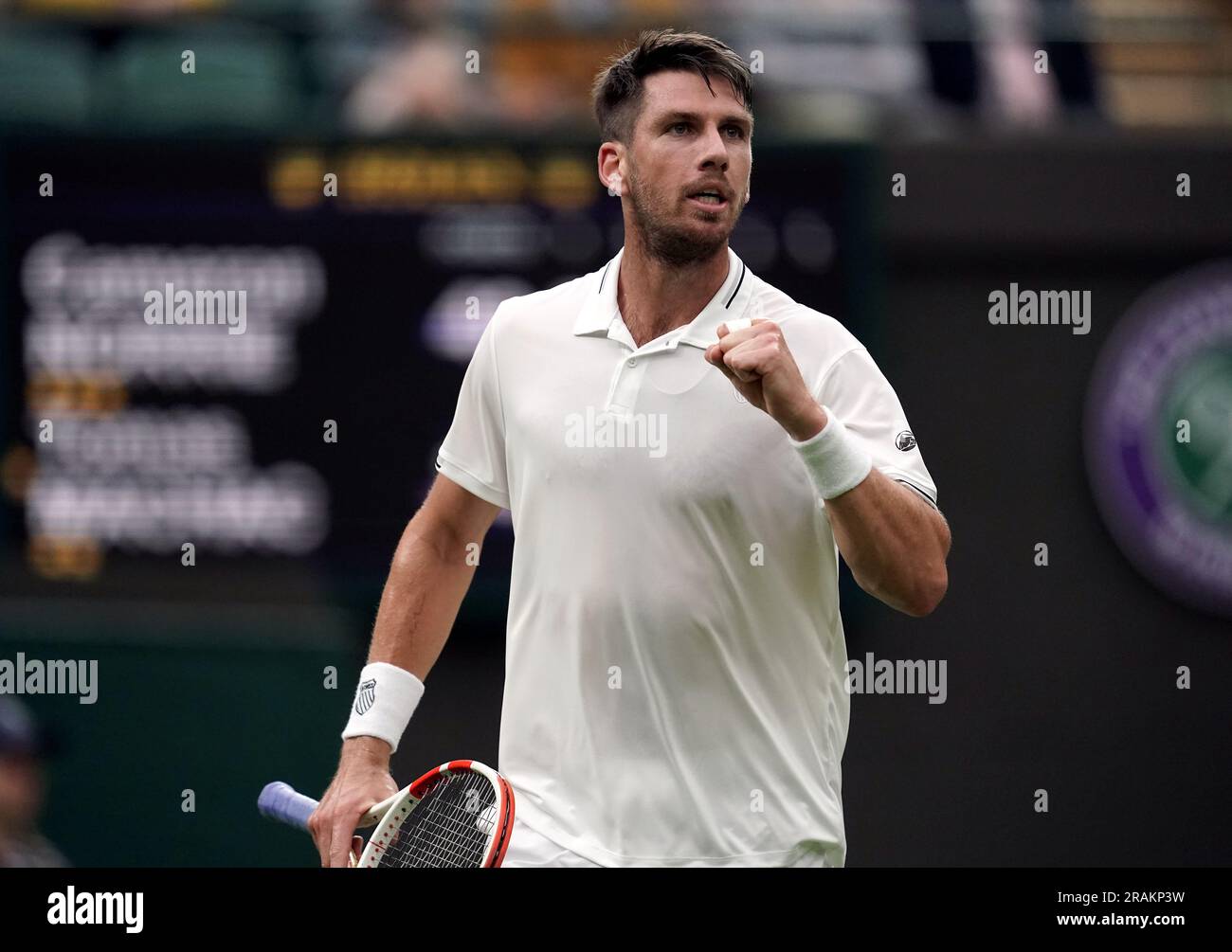 Cameron Norrie celebrates winning the first set against Tomas Machac ...