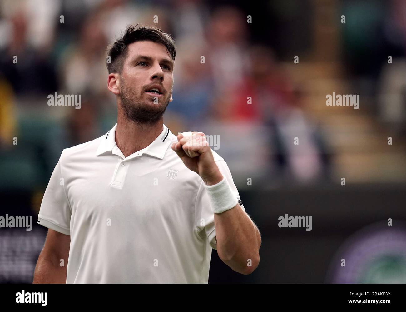 Cameron Norrie celebrates winning the first set against Tomas Machac ...