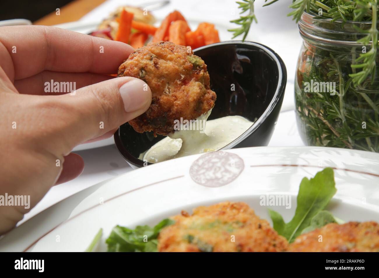 Traditional fish cakes served in the restaurant Stock Photo - Alamy