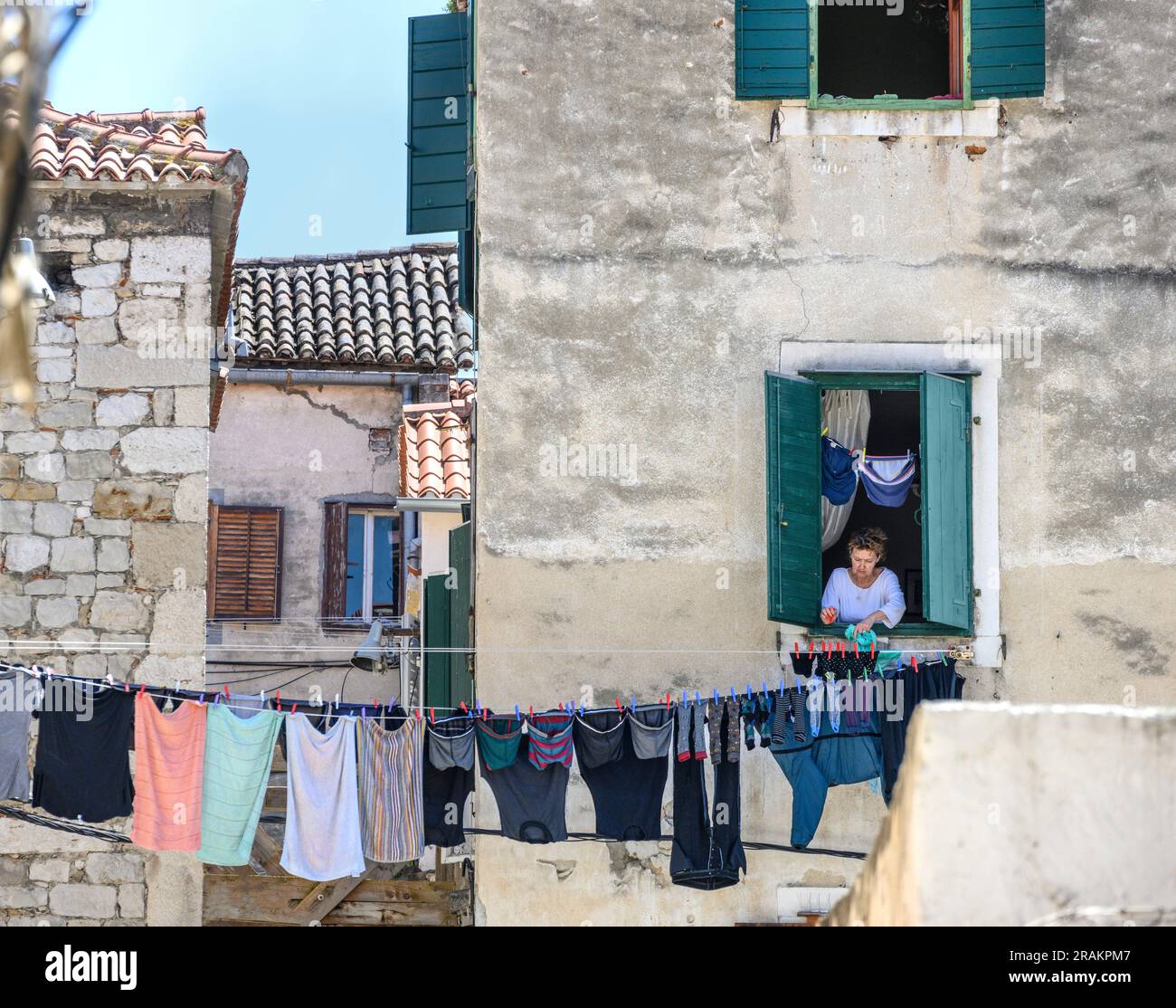Wash day in Split's Medieval old town next to the walls of Diocletian's ...