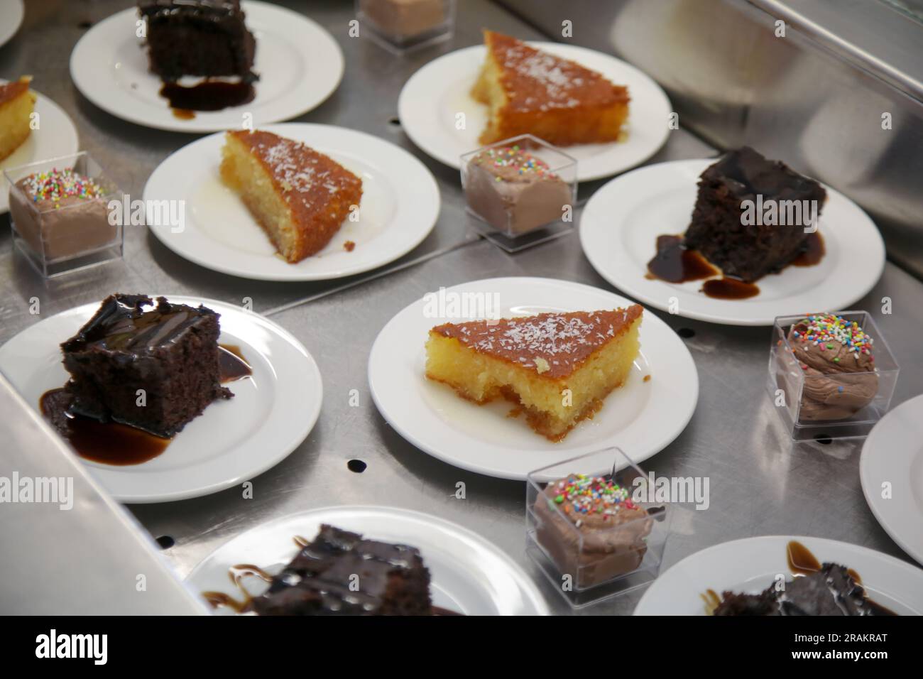 Various desserts served in a buffet line Stock Photo - Alamy